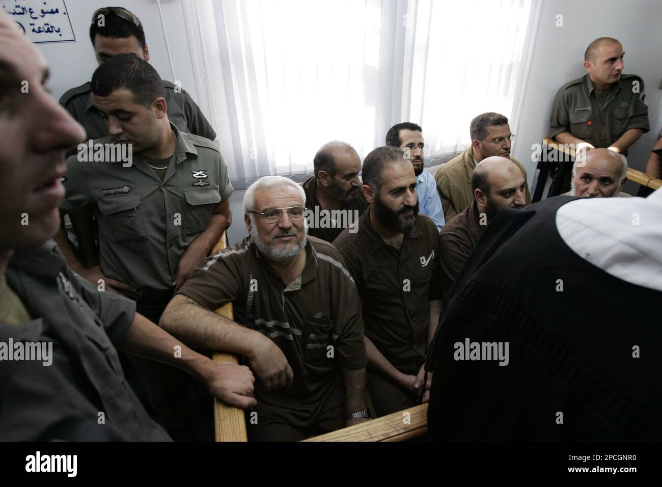 Surrounded by Israeli police, Hamas lawmakers including Parliament ...