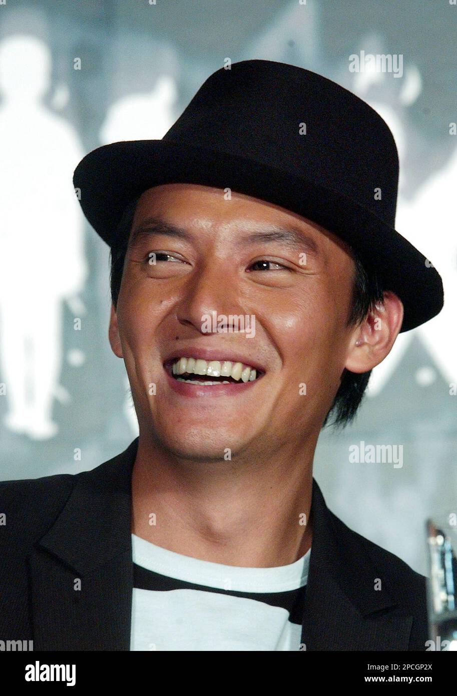 Taiwan actor Chang Chen poses for photographers during a media ...