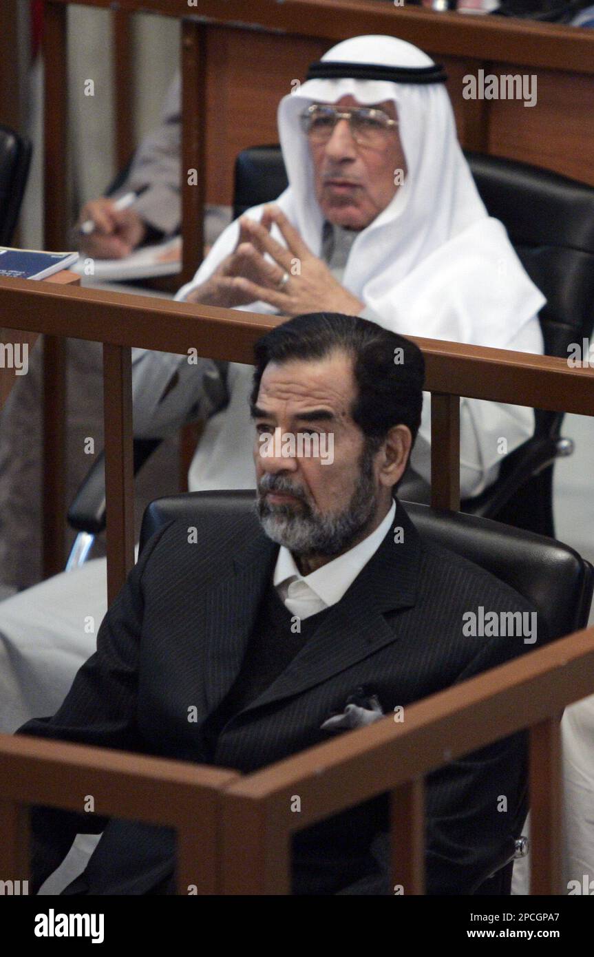 Saddam Hussein, front, and Hussein Rashid Mohammed, former deputy ...