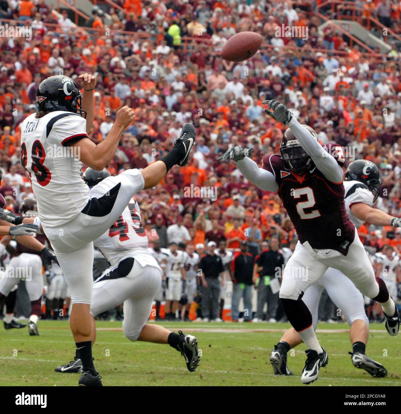 Virginia Tech safety Josh Morgan blocks a punt against Cincinnati's ...