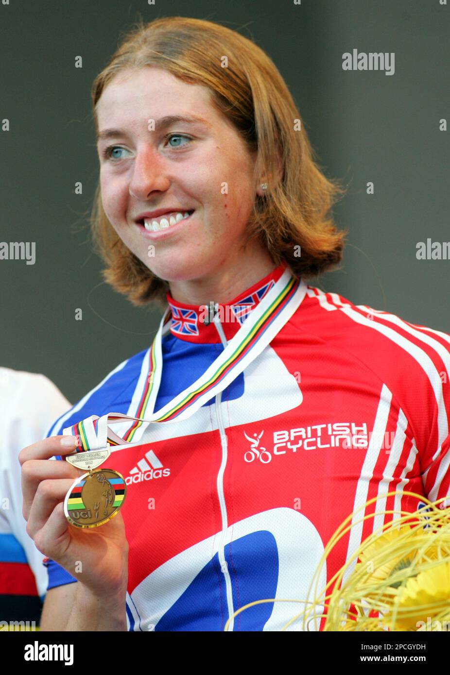 Nicole Cooke of Britain shows the bronze medal of the women's race, at ...
