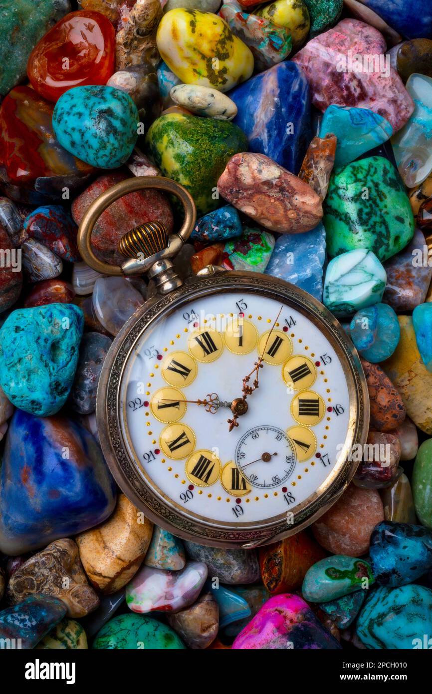 Old Pocket Watch On Polished Stones Still life Stock Photo - Alamy