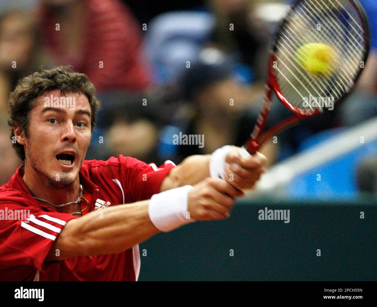 Russian Marat Safin Returns A Ball To Us Andy Roddick During The Davis Cup Semifinal Match