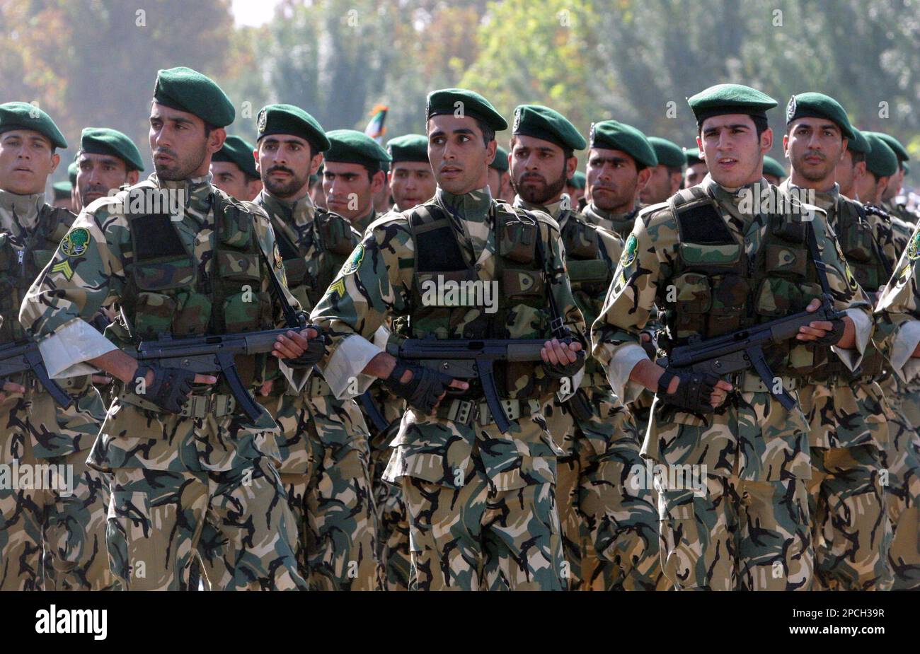 Members of the Iranian army march during a parade ceremony, marking the ...