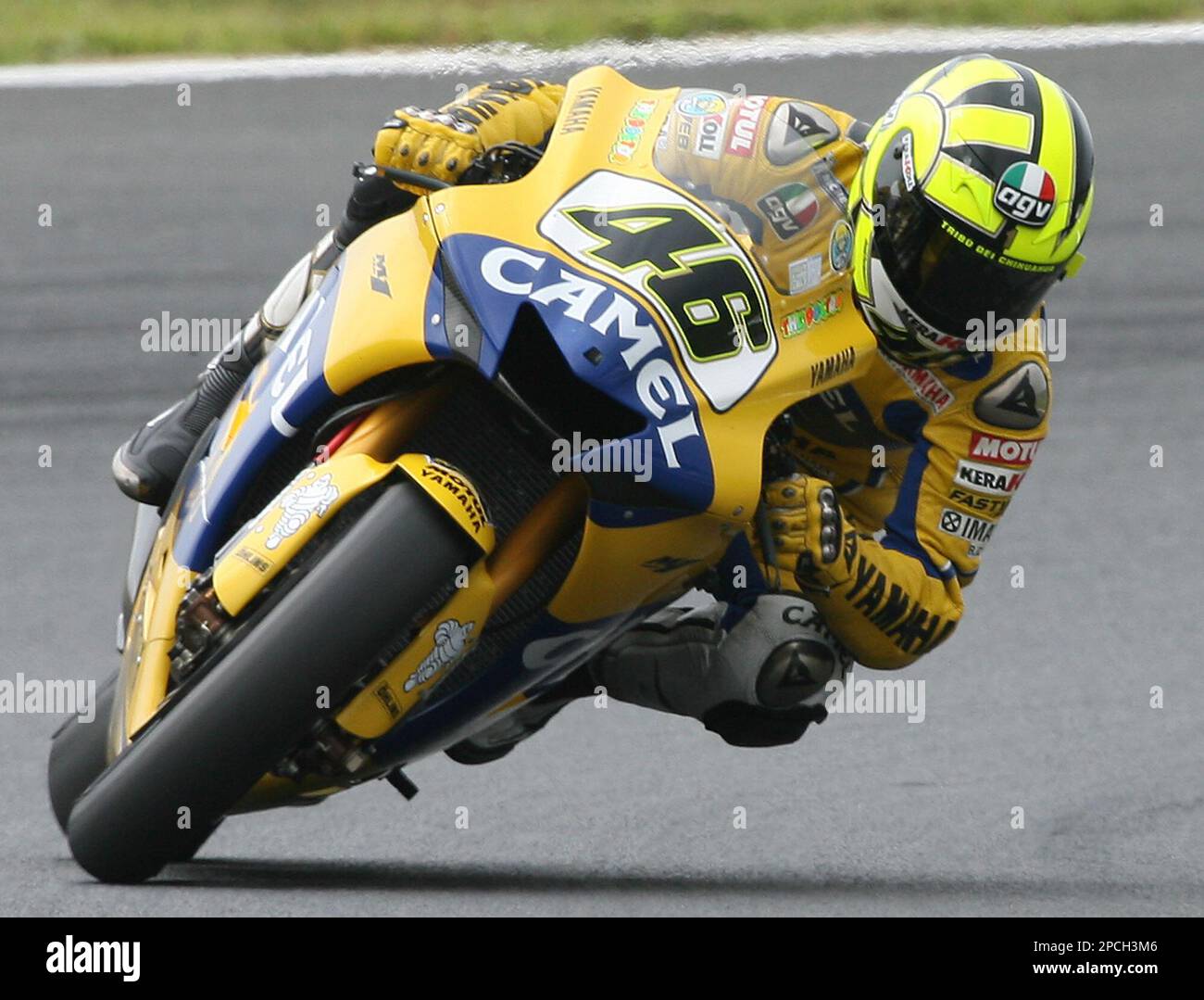 Italys MotoGP rider Valentino Rossi steers his Yamaha during a free ...