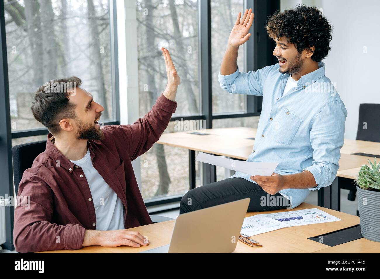 Two successful male business colleagues, creative business people ...