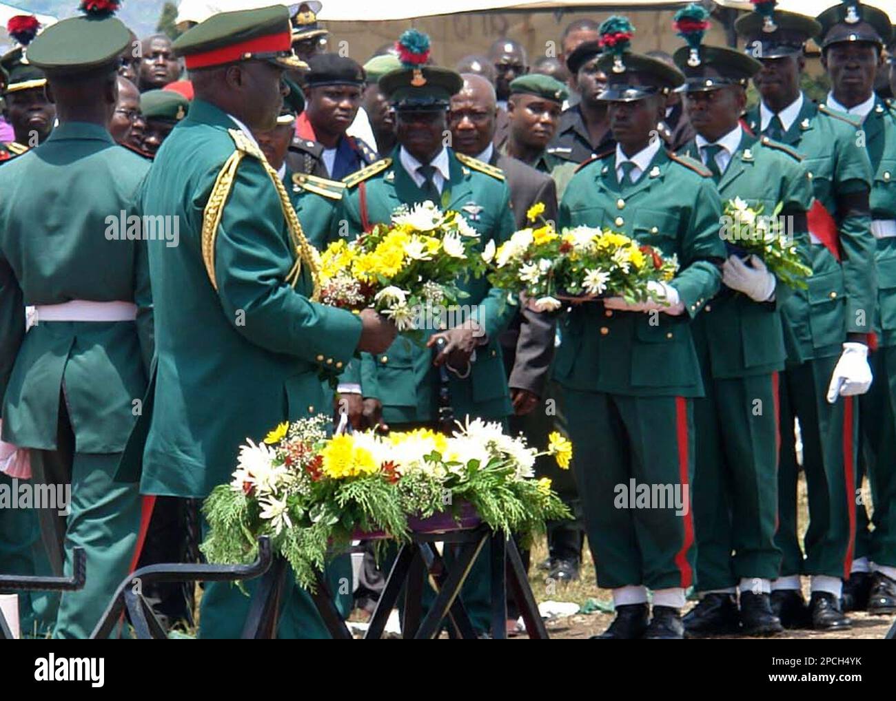Nigeria's chief of defence staff Matins Aguwai, left, lays a wreath at ...