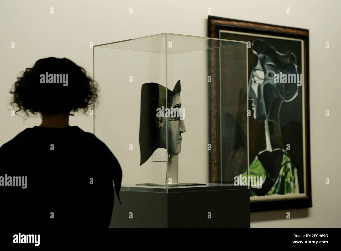 A visitor watches works by famed Spanish Artist Pablo Picasso, on ...