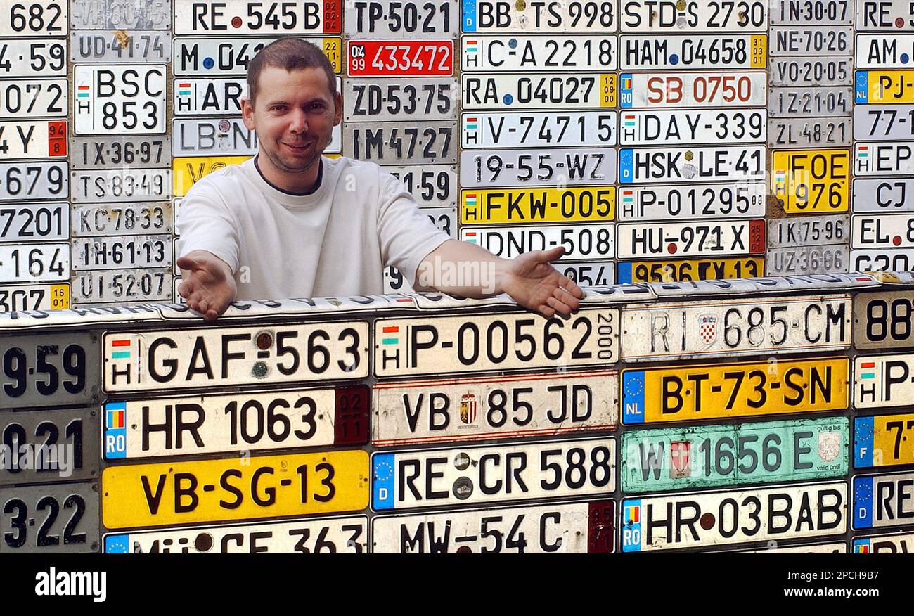 Peter Kenyeres, Guinness-recorder licence plate-collector, shows some ...