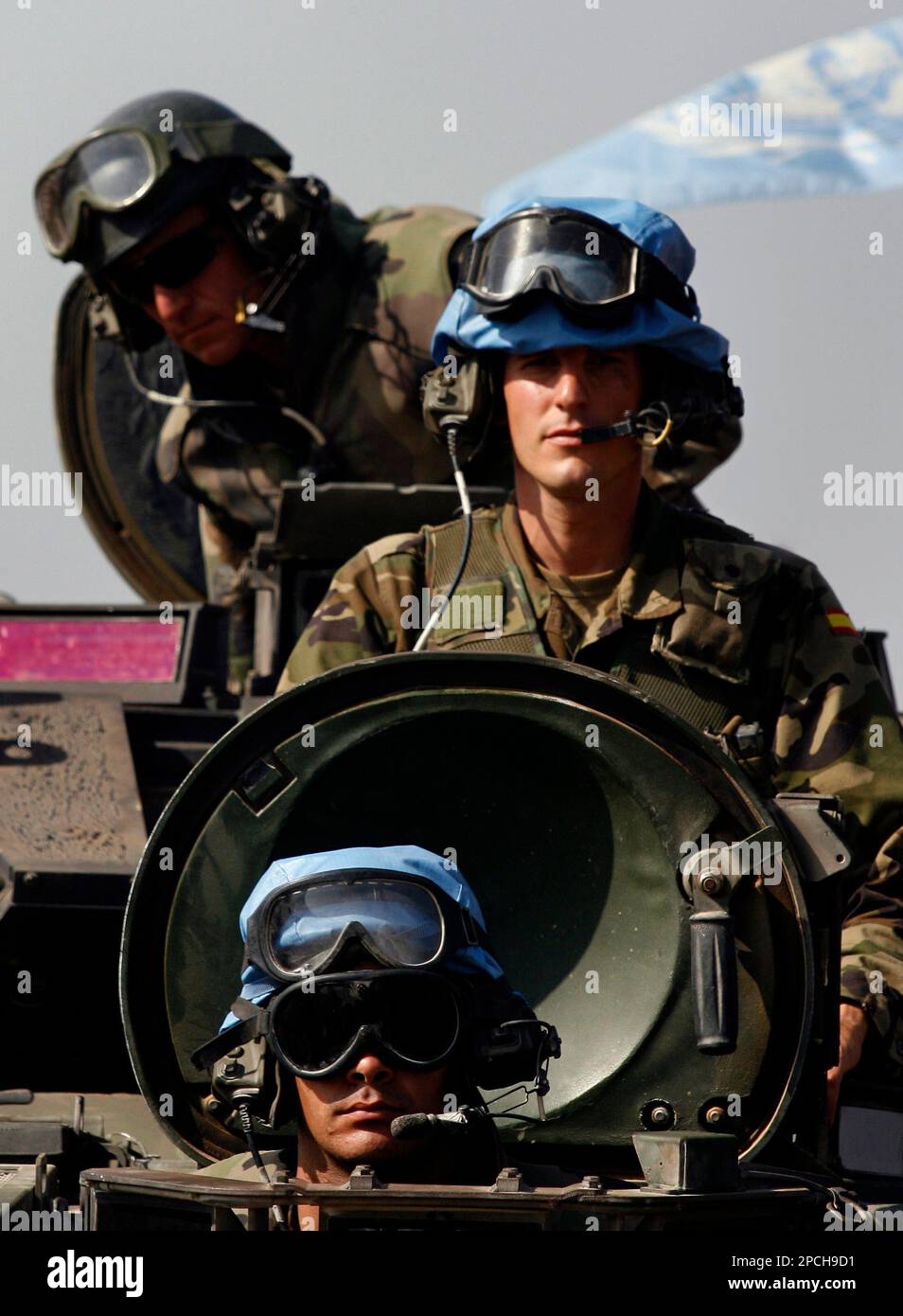 Spanish U.N. peacekeepers, sitting atop an armored personnel carrier ...