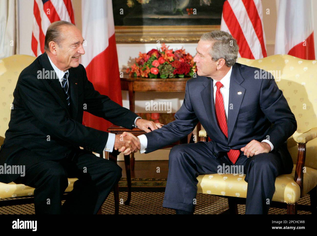 President Bush meets with French President Jacques Chirac during ...