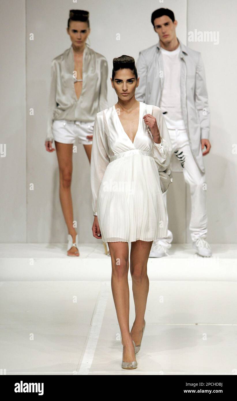 Models on the catwalk display outfits from the Unconditional Spring ...