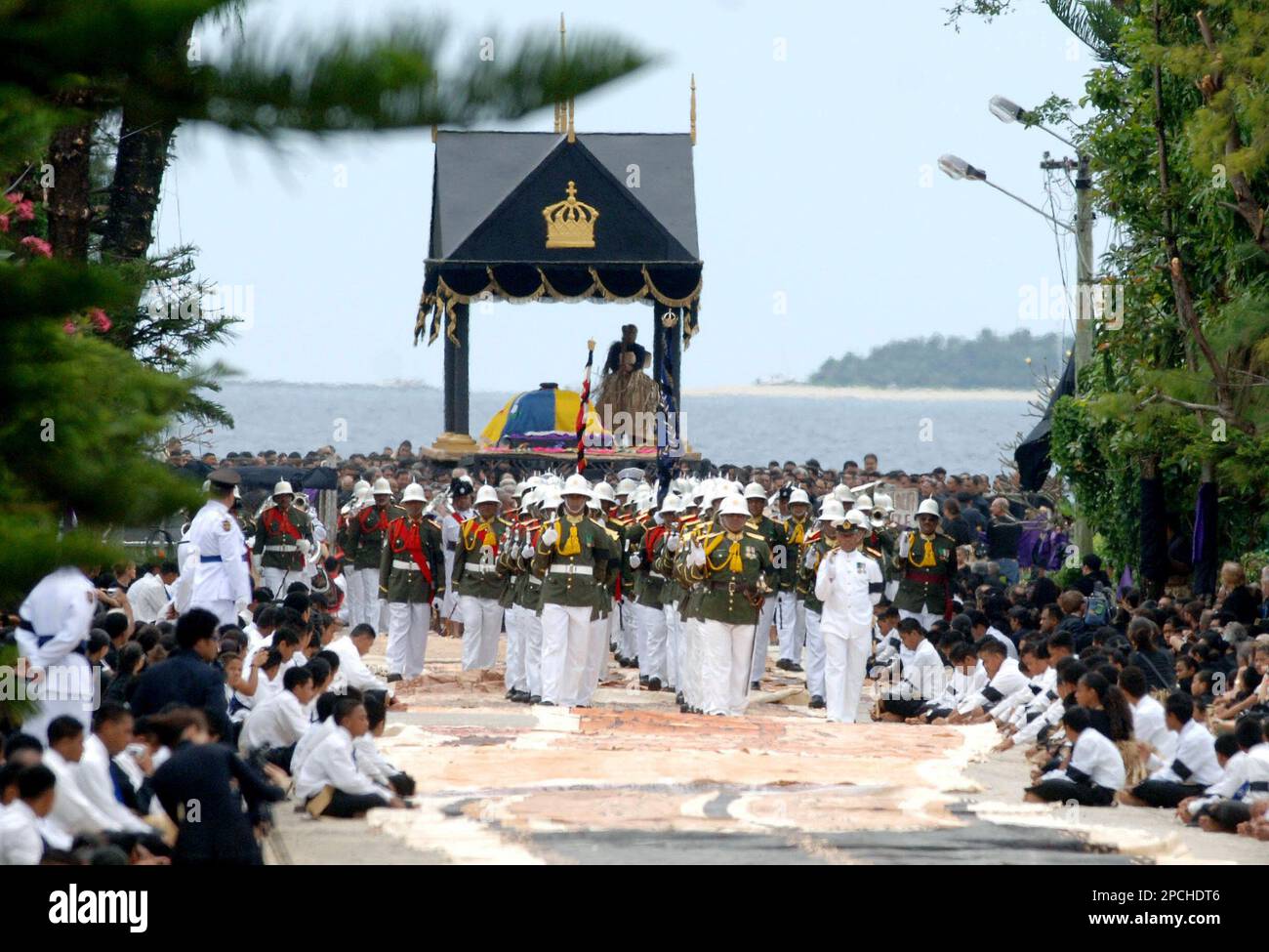 The catafalque bearing the casket of King Taufa'ahau Tupou, moves ...