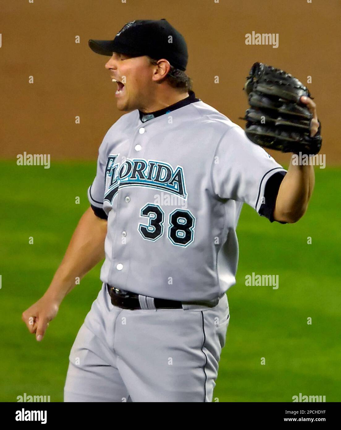 Florida Marlins pitcher Brian Moehler reacts after allowing New York ...