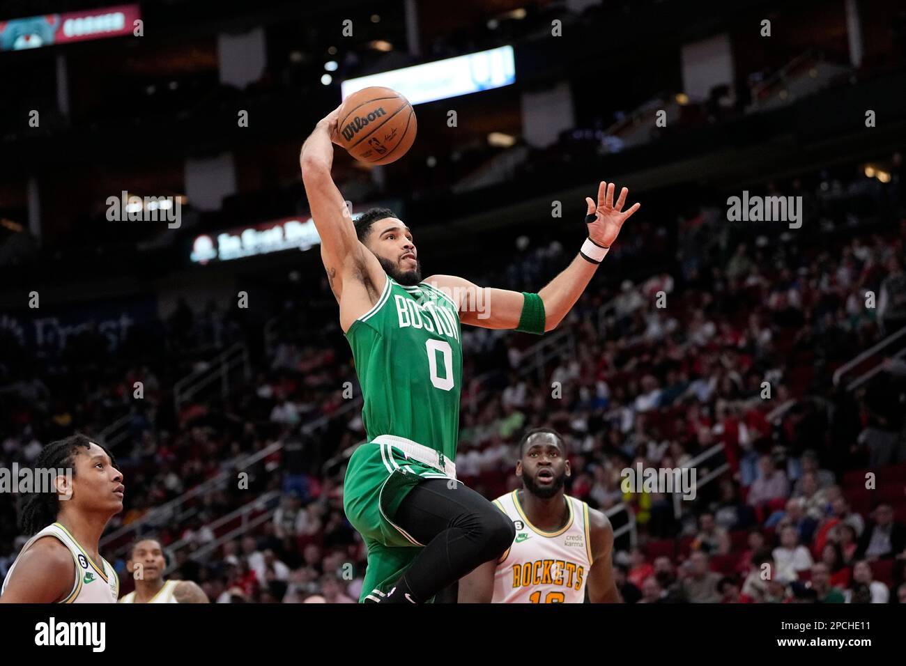 Boston Celtics' Jayson Tatum (0) goes up to attempt a dunk against the ...