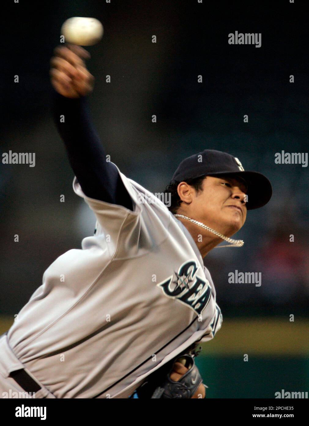 Seattle Mariners pitcher Felix Hernandez delivers to the Texas Rangers ...