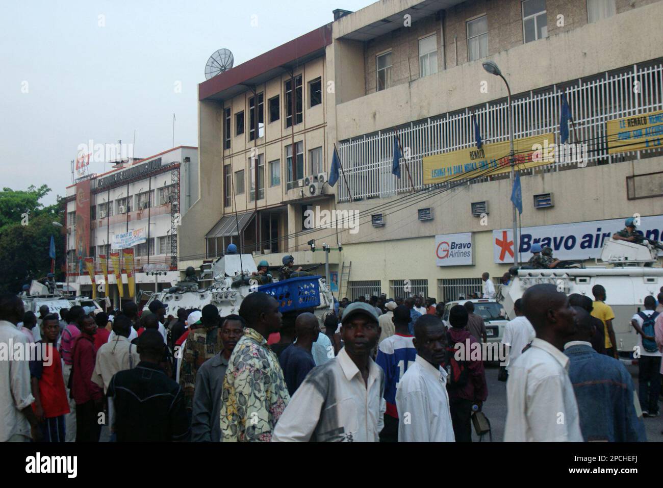 A U.N. tank drives among supporters of Congolese presidential ...