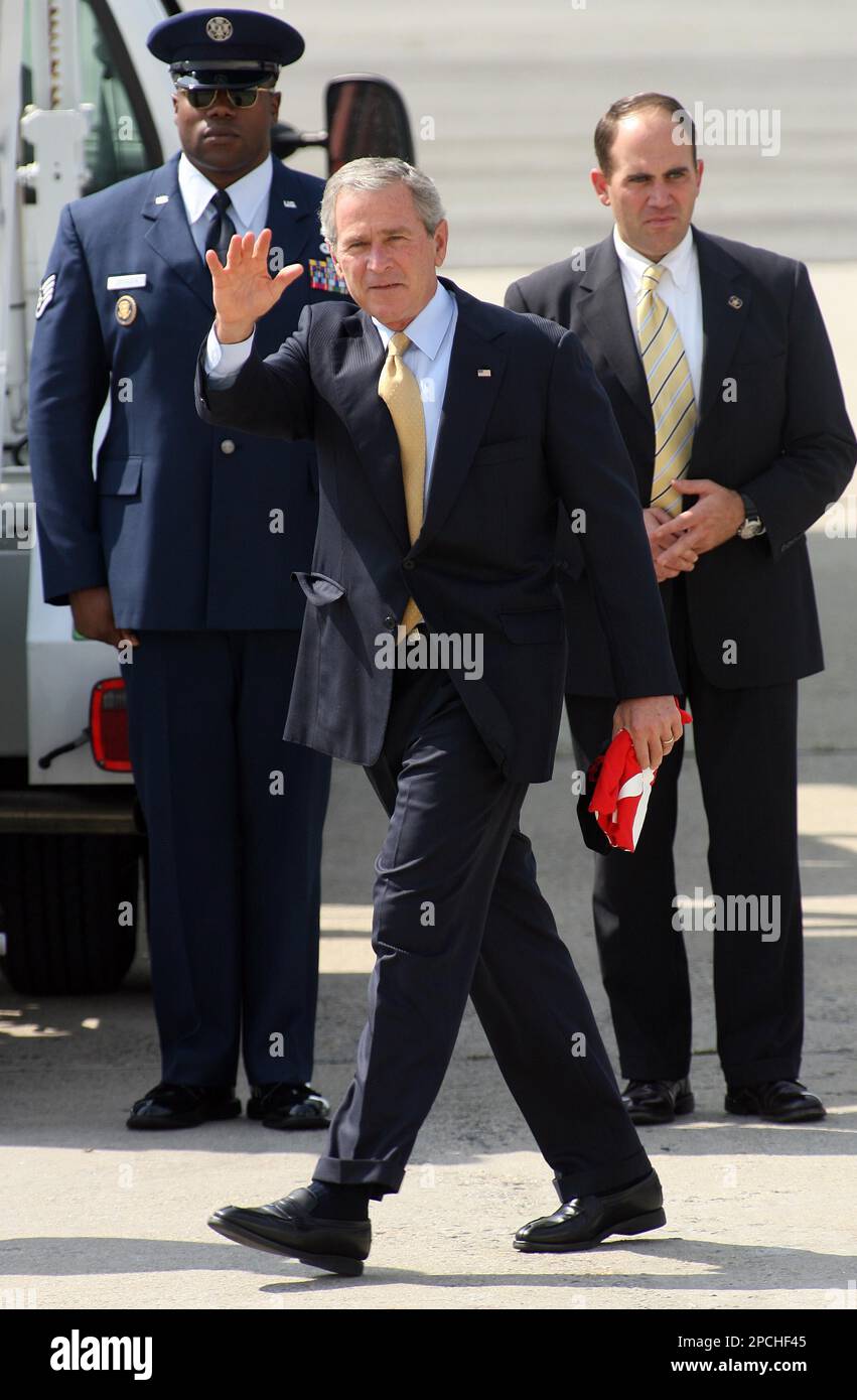 US President George Bush waves upon his arrival at JFK airport in New ...