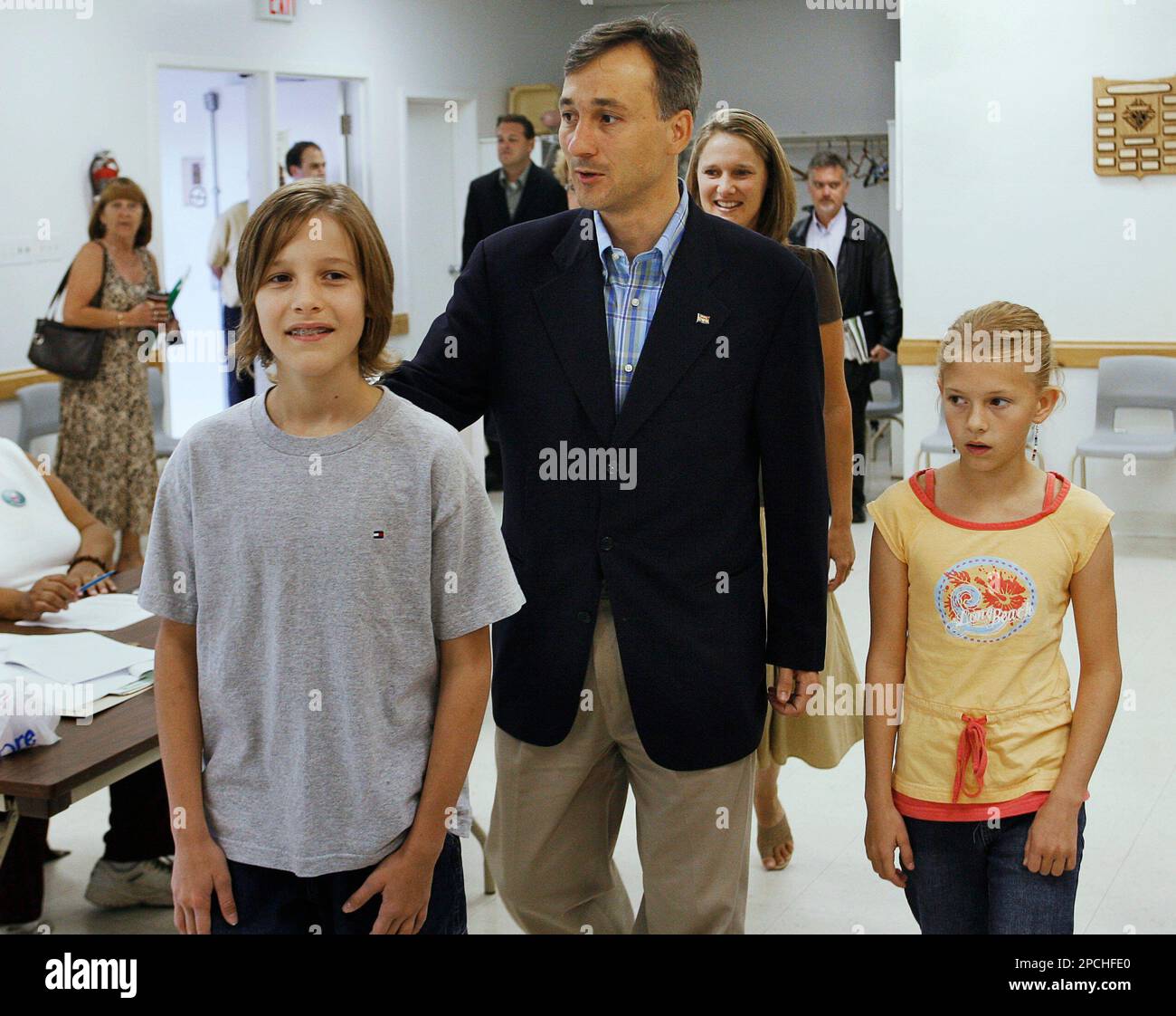 New Brunswick Premier Bernard Lord arrives at the polling station with ...