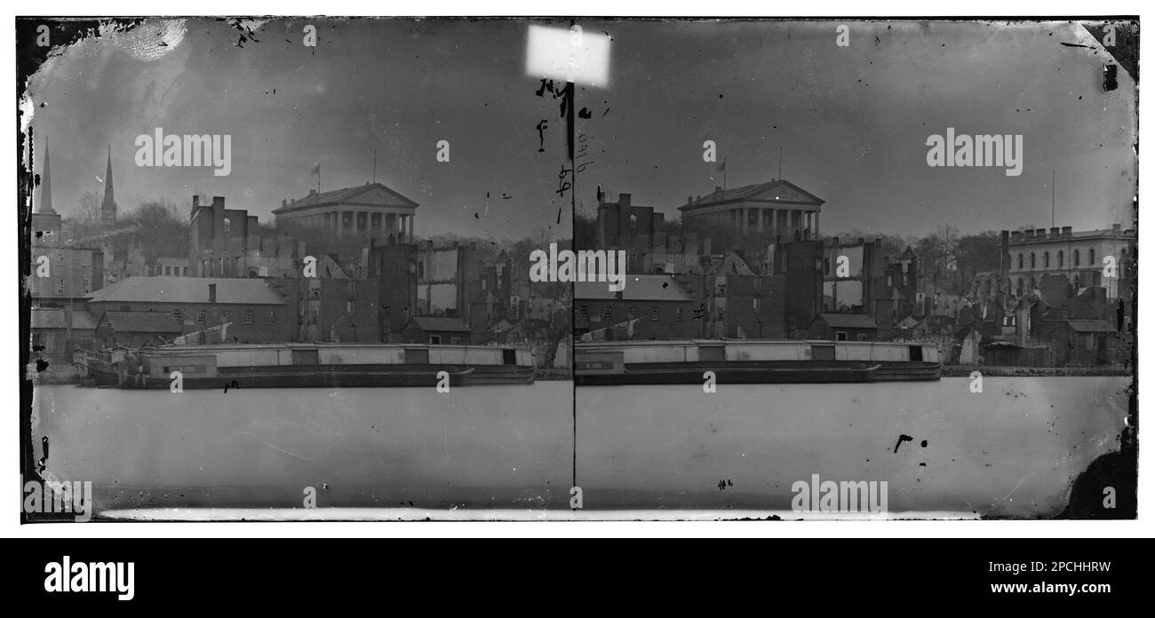 Richmond, Virginia. View burnt district and Capitol building from canal ...