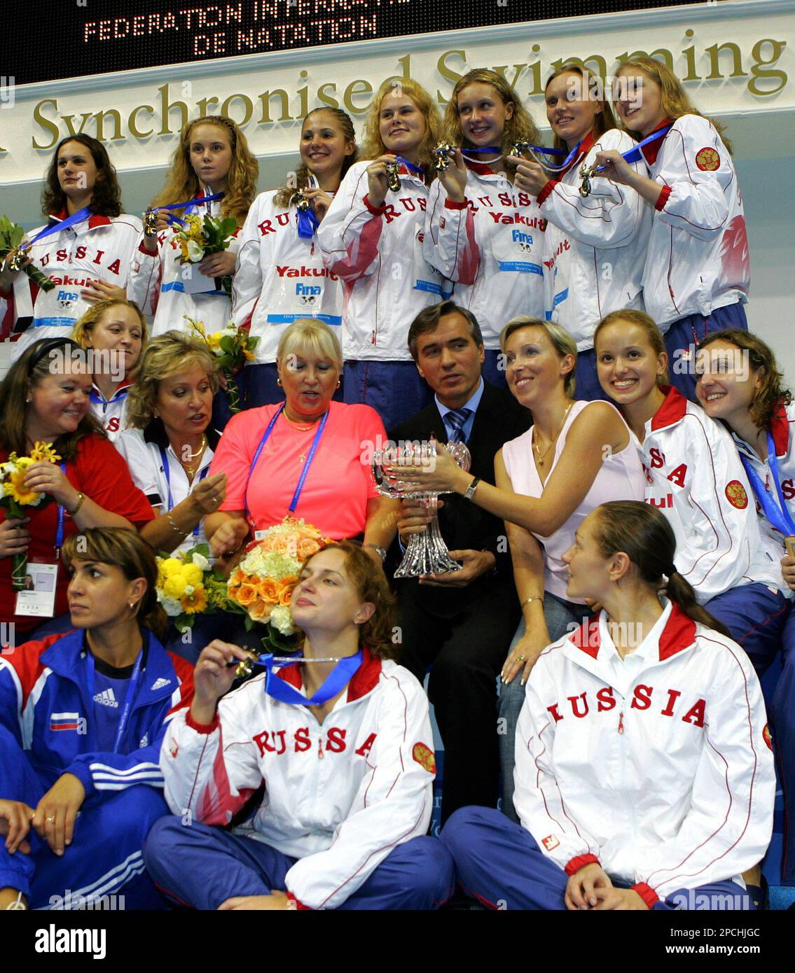 Russia's Synchronized Swimming team members pose for photographers ...