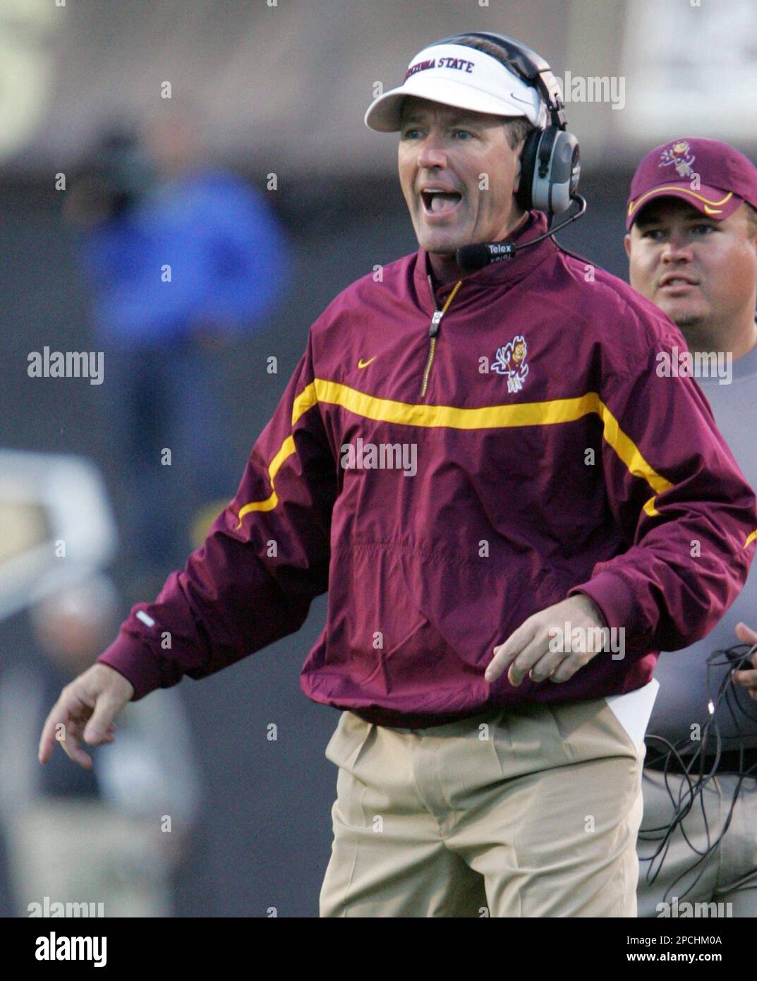 Arizona State coach Dirk Koetter yells to his team during the second ...