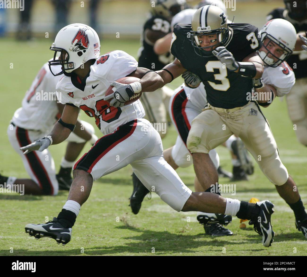 Ball State's Dante Love is pursued by Purdue's Garret Bushong during a ...