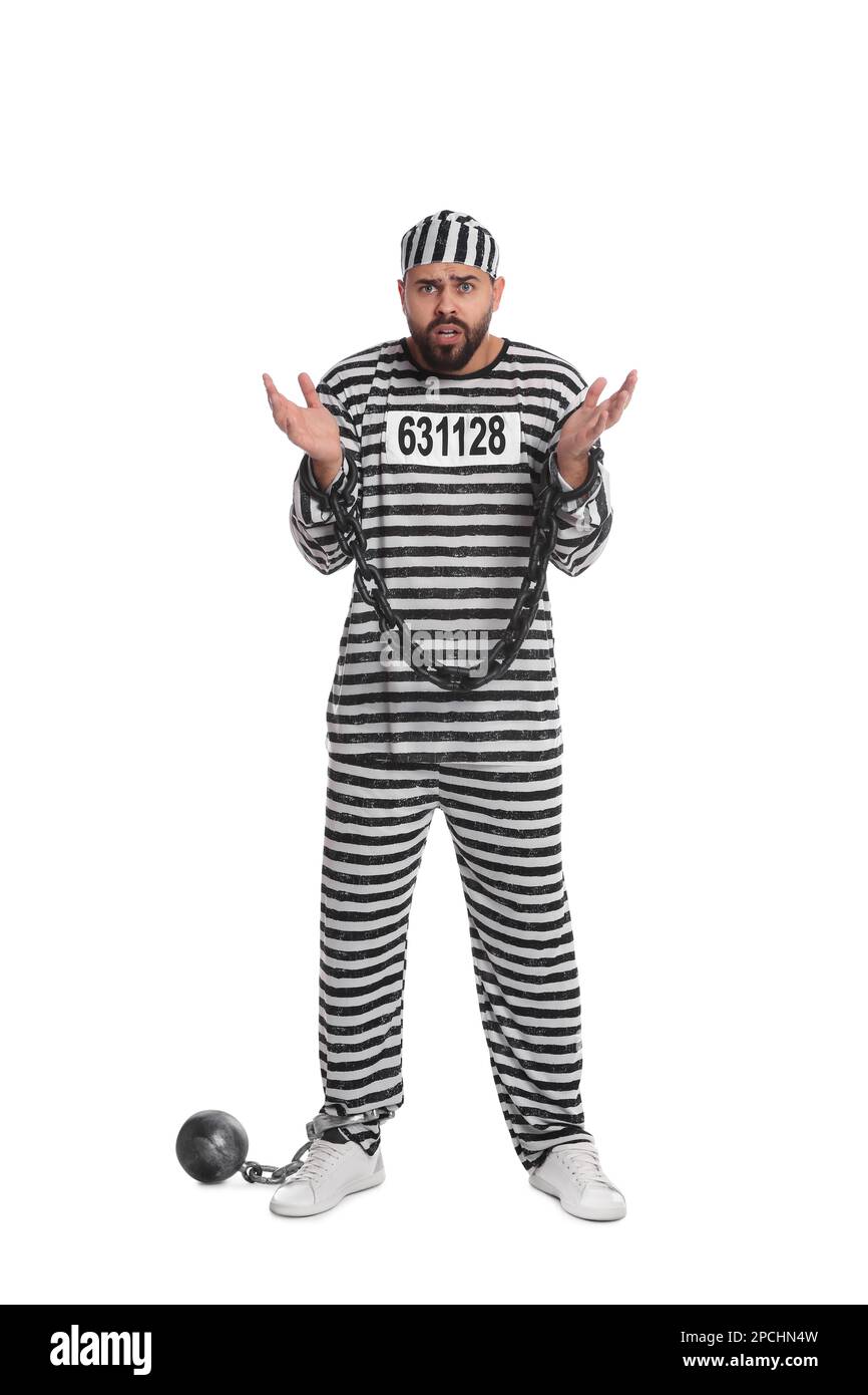 Prisoner in special uniform with chained hands and metal ball on white ...