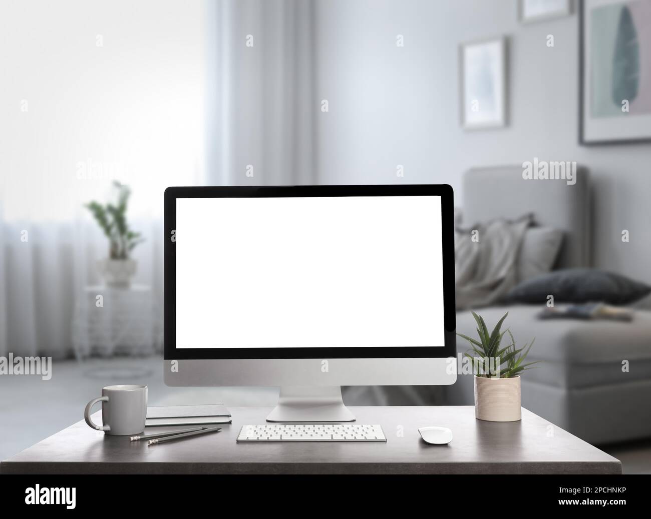 Workplace with modern computer on table indoors. Mockup for design ...