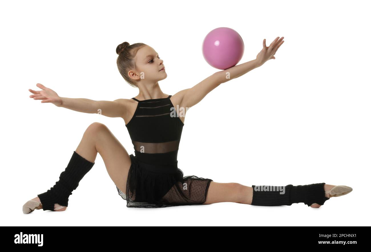 Cute little gymnast doing with ball on white background Stock Photo - Alamy