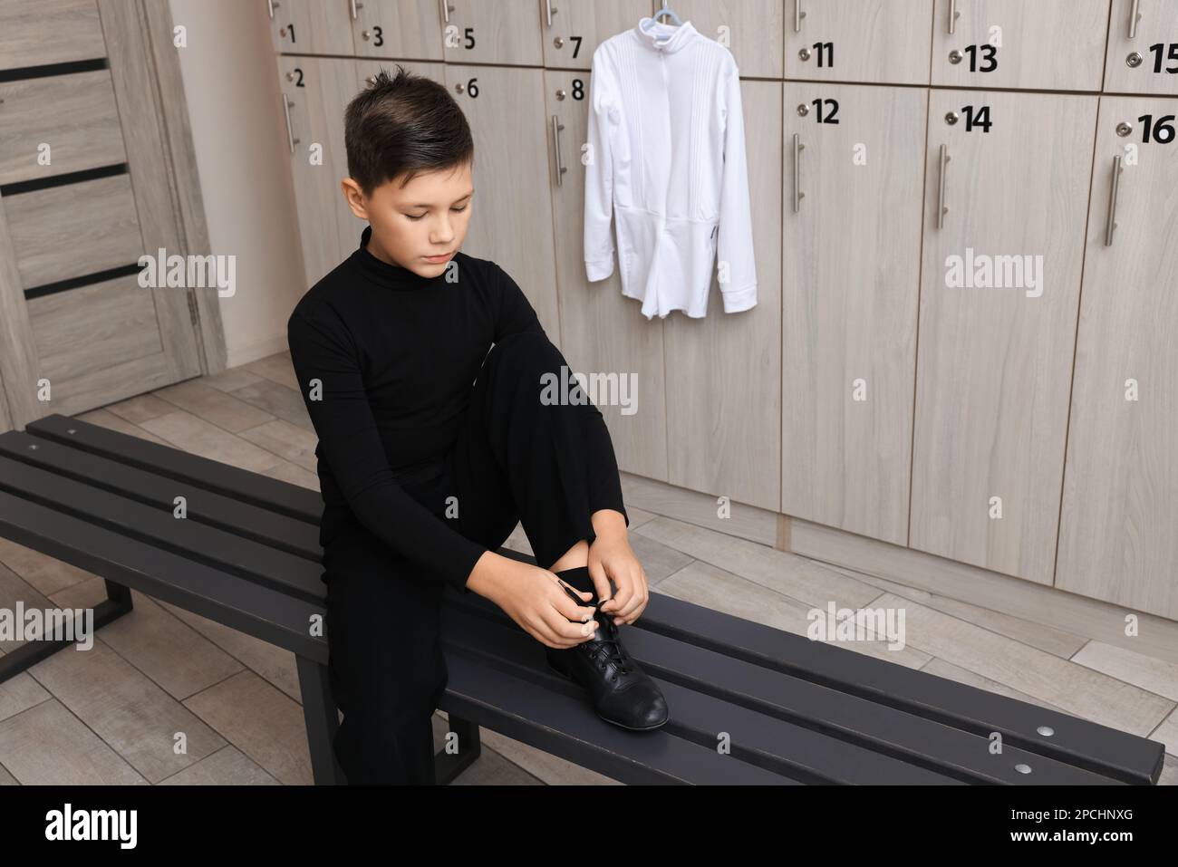 Boy changing clothes hi-res stock photography and images - Alamy