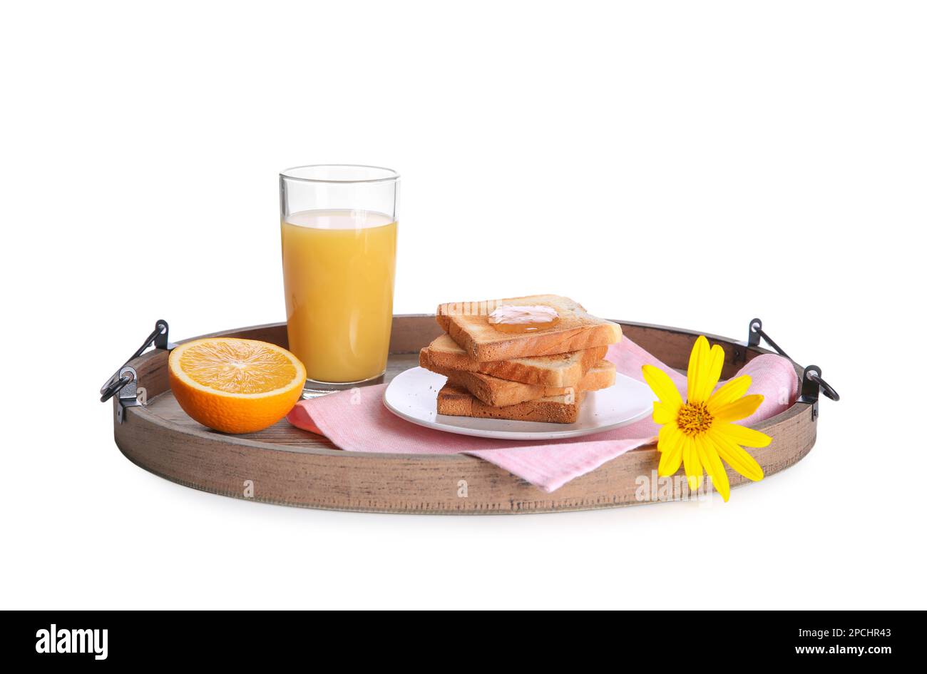 Wooden tray with delicious breakfast and beautiful flower on white ...