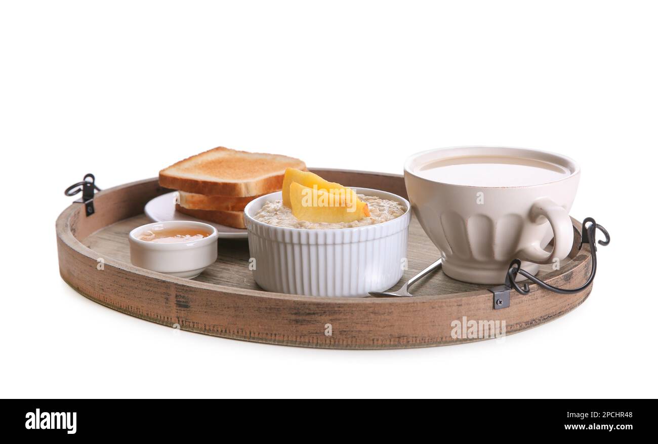 Wooden tray with delicious breakfast on white background Stock Photo ...