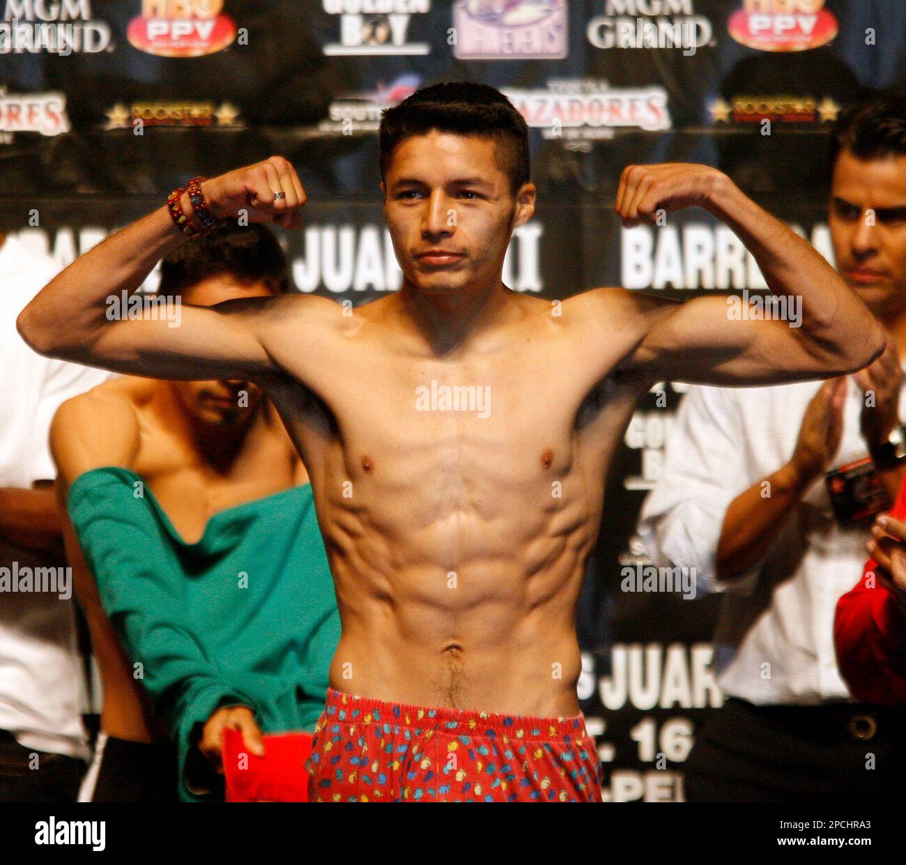 Boxer Jhonny Gonzalez weighs in at the MGM Grand Garden Arena in Las ...