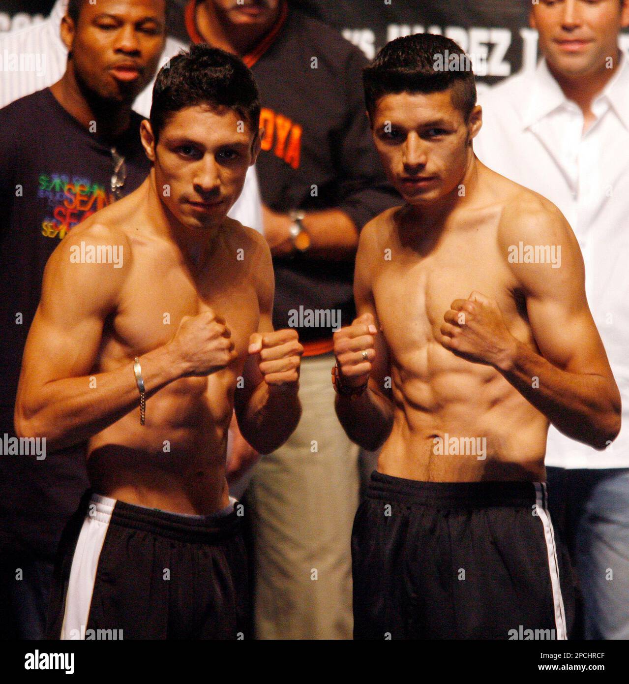 Boxers Jhonny Gonzalez, left, and Israel Vazquez pose for photos at ...