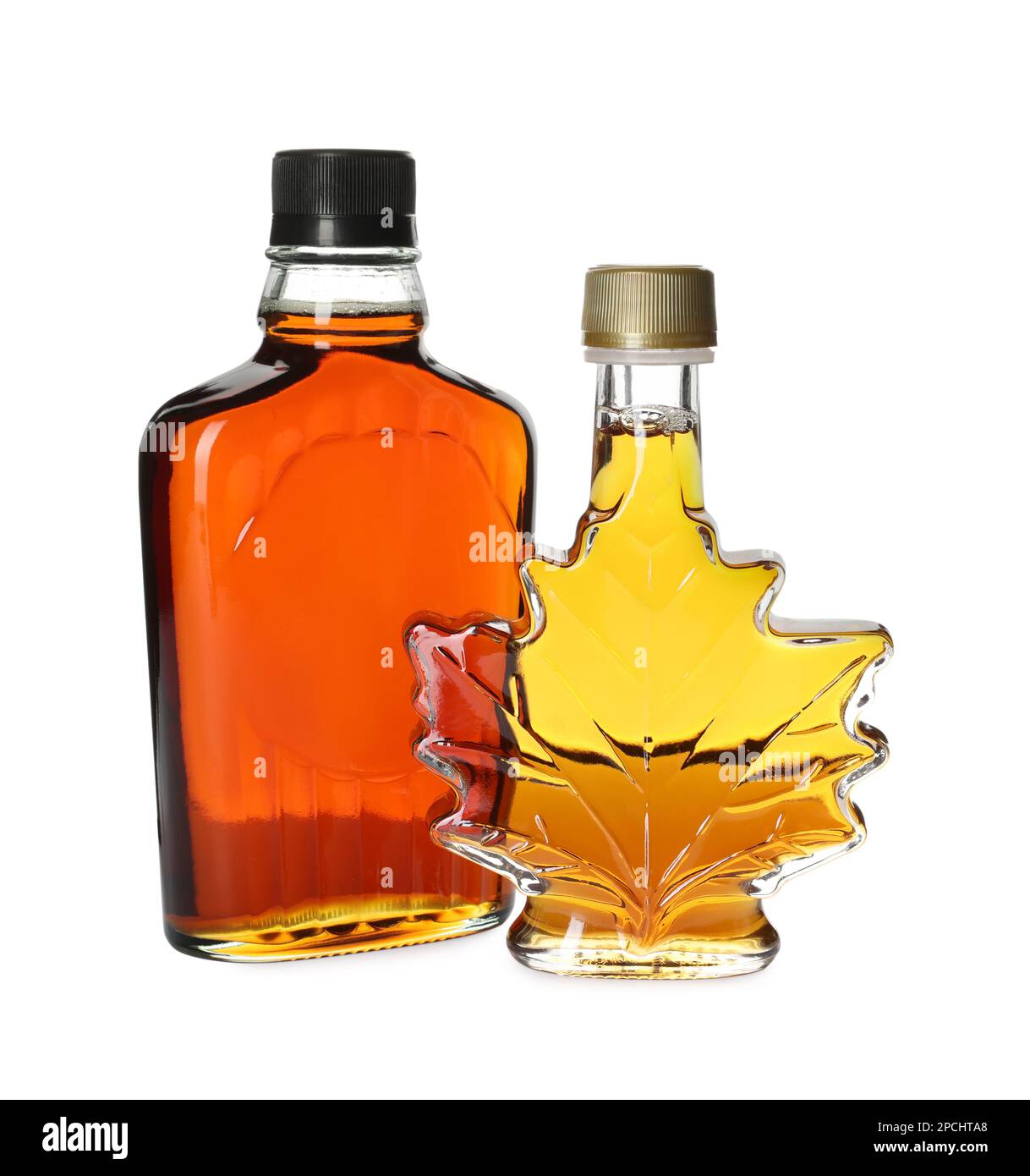 Different bottles of tasty maple syrup on white background Stock Photo ...