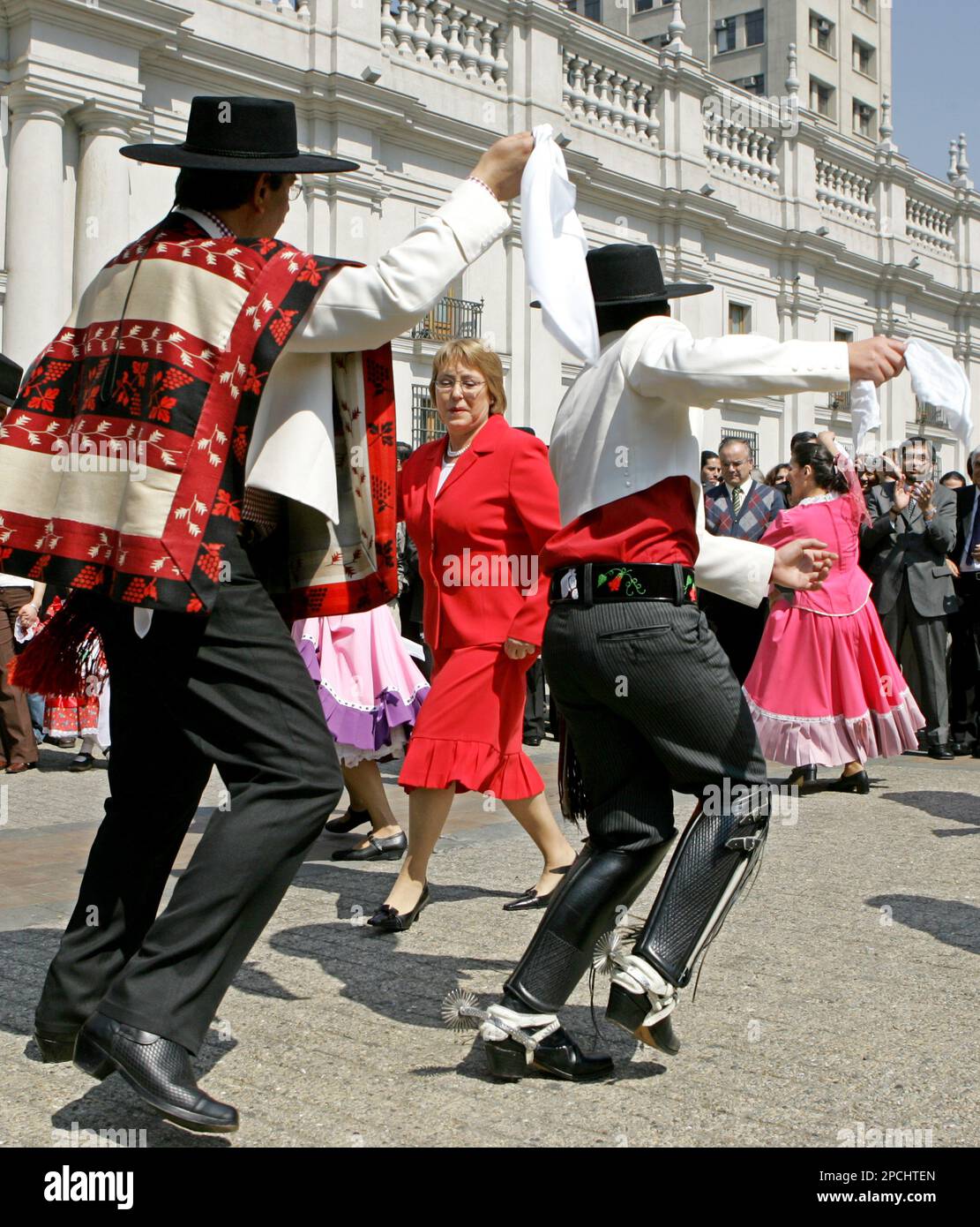 Chile's President Michelle Bachelet, center, dances a "Cueca" while ...