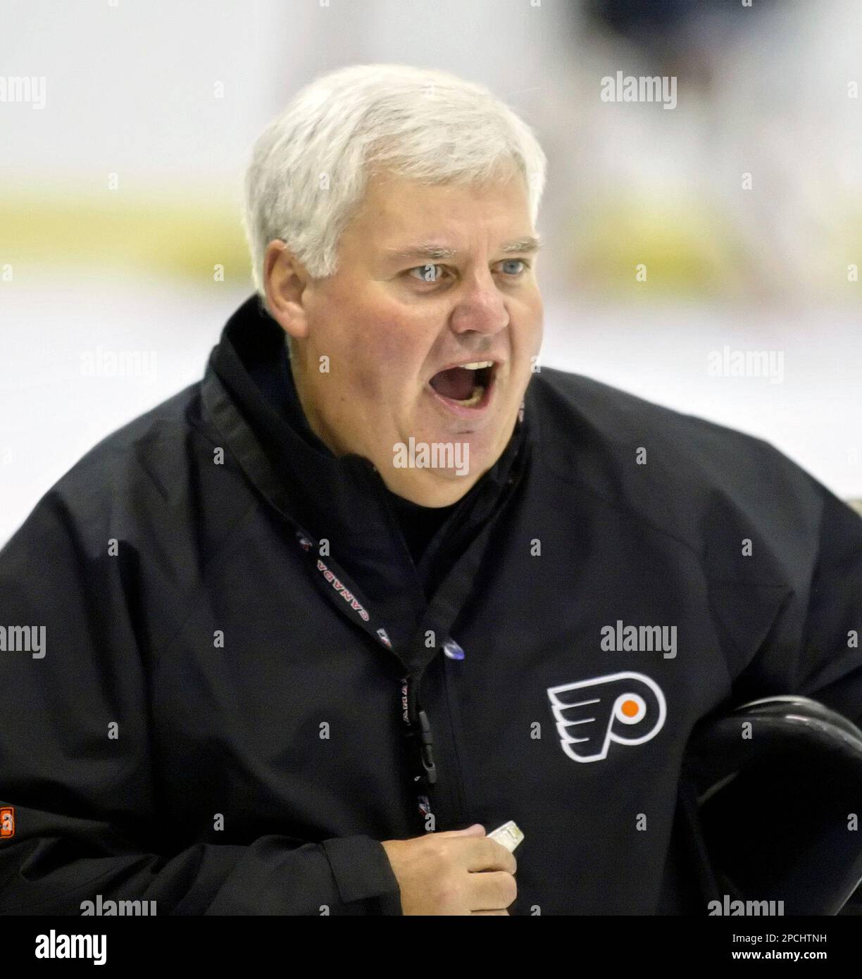 Philadelphia Flyers' Head Coach Ken Hitchcock watches his team practice ...