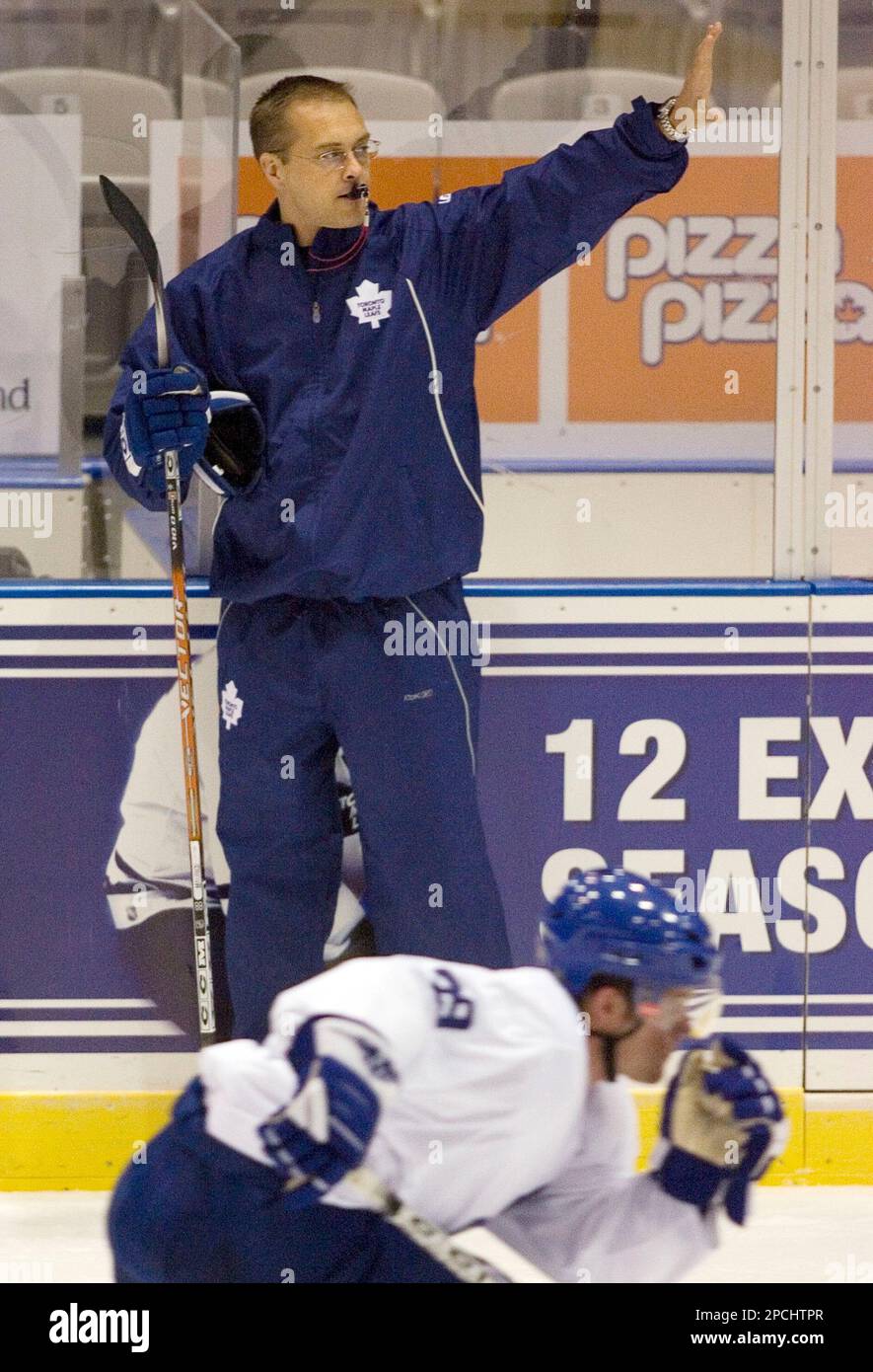 Toronto Maple Leafs head coach Paul Maurice keeps an eye on the action ...