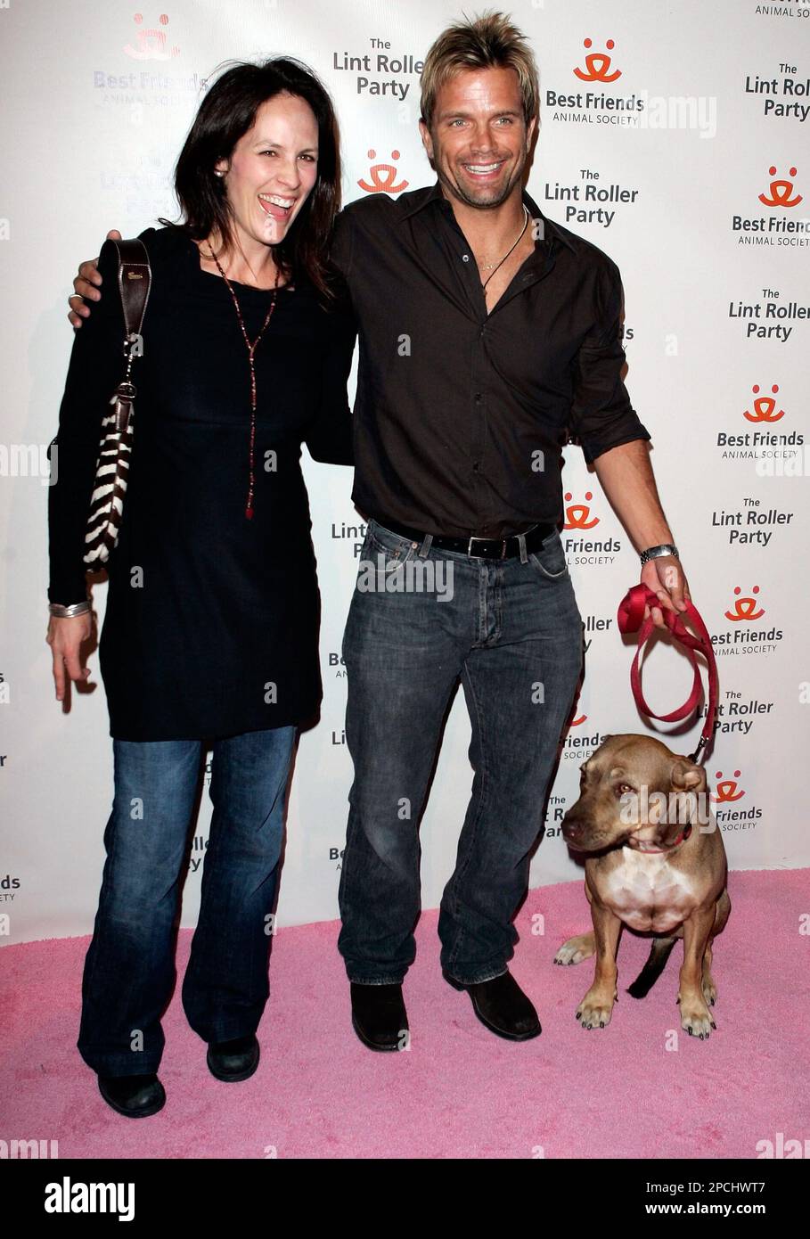 Actress Annabeth Gish, left, and her husband David Chokachi poses for ...