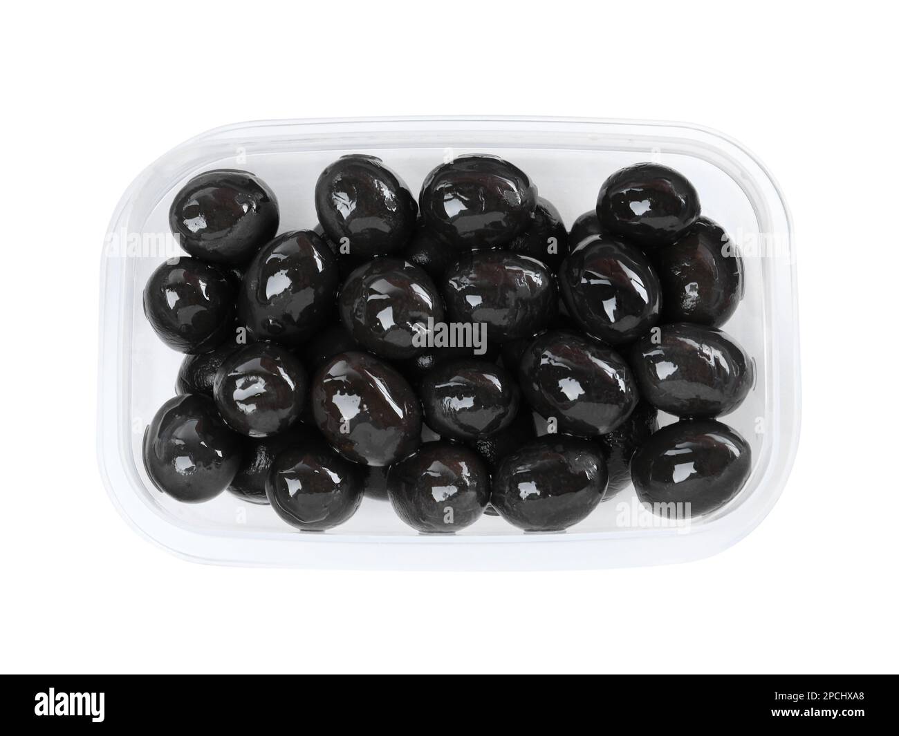 Fresh black olives in plastic container isolated on white, top view ...