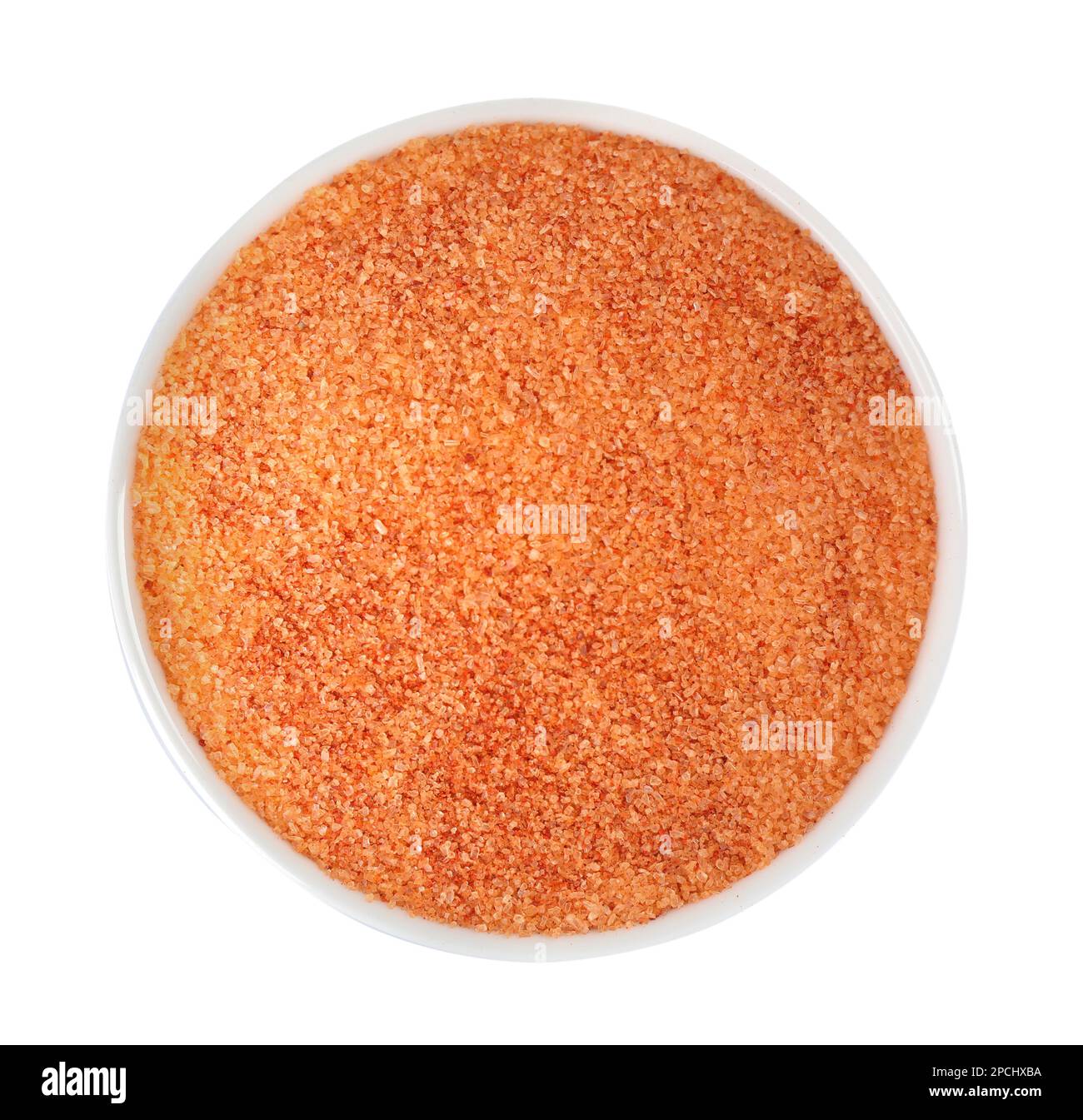 Orange salt in bowl isolated on white, top view Stock Photo - Alamy