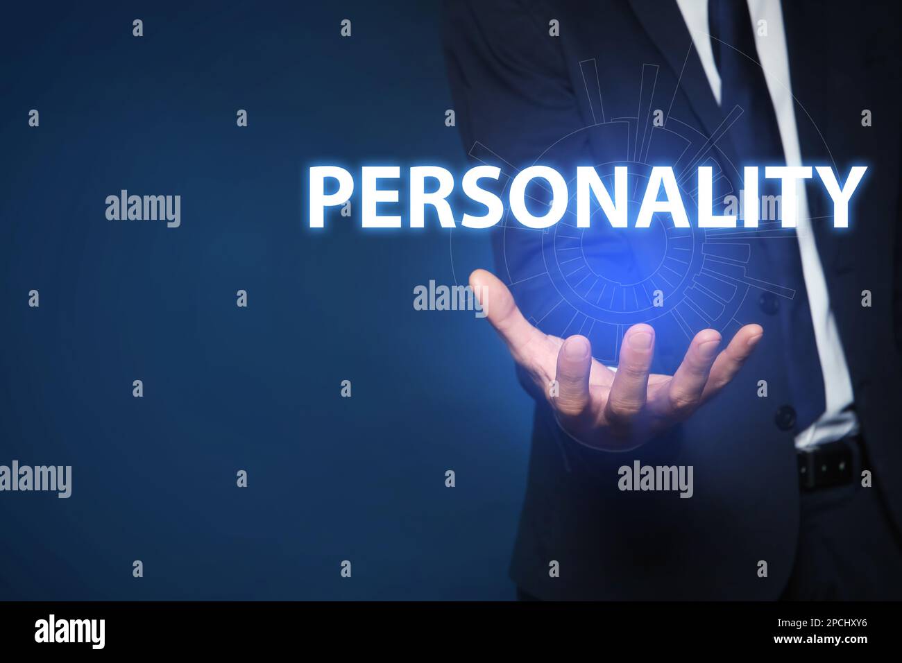 Man showing virtual model of word PERSONALITY against dark blue ...