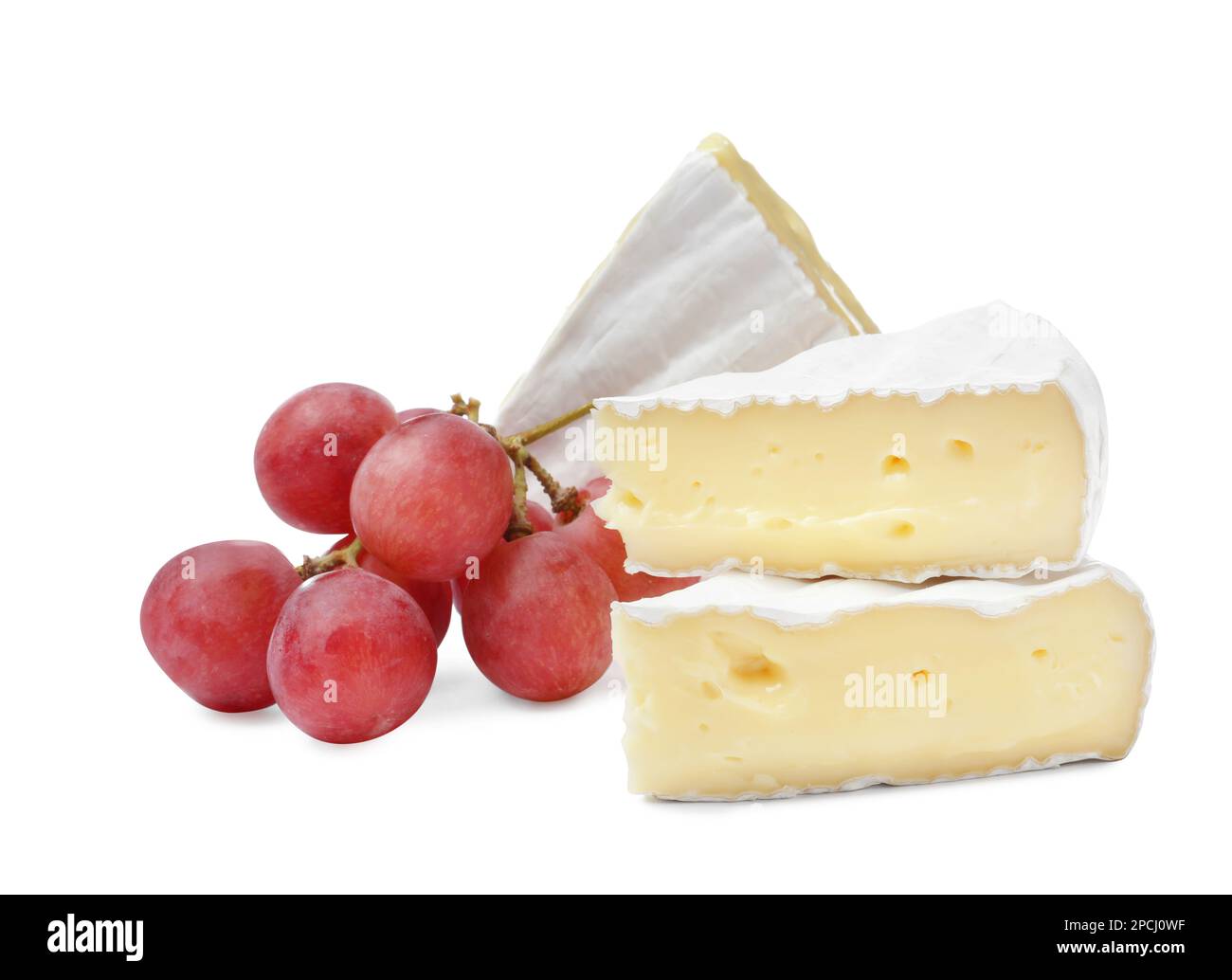 Tasty cut brie cheese with grapes on white background Stock Photo - Alamy