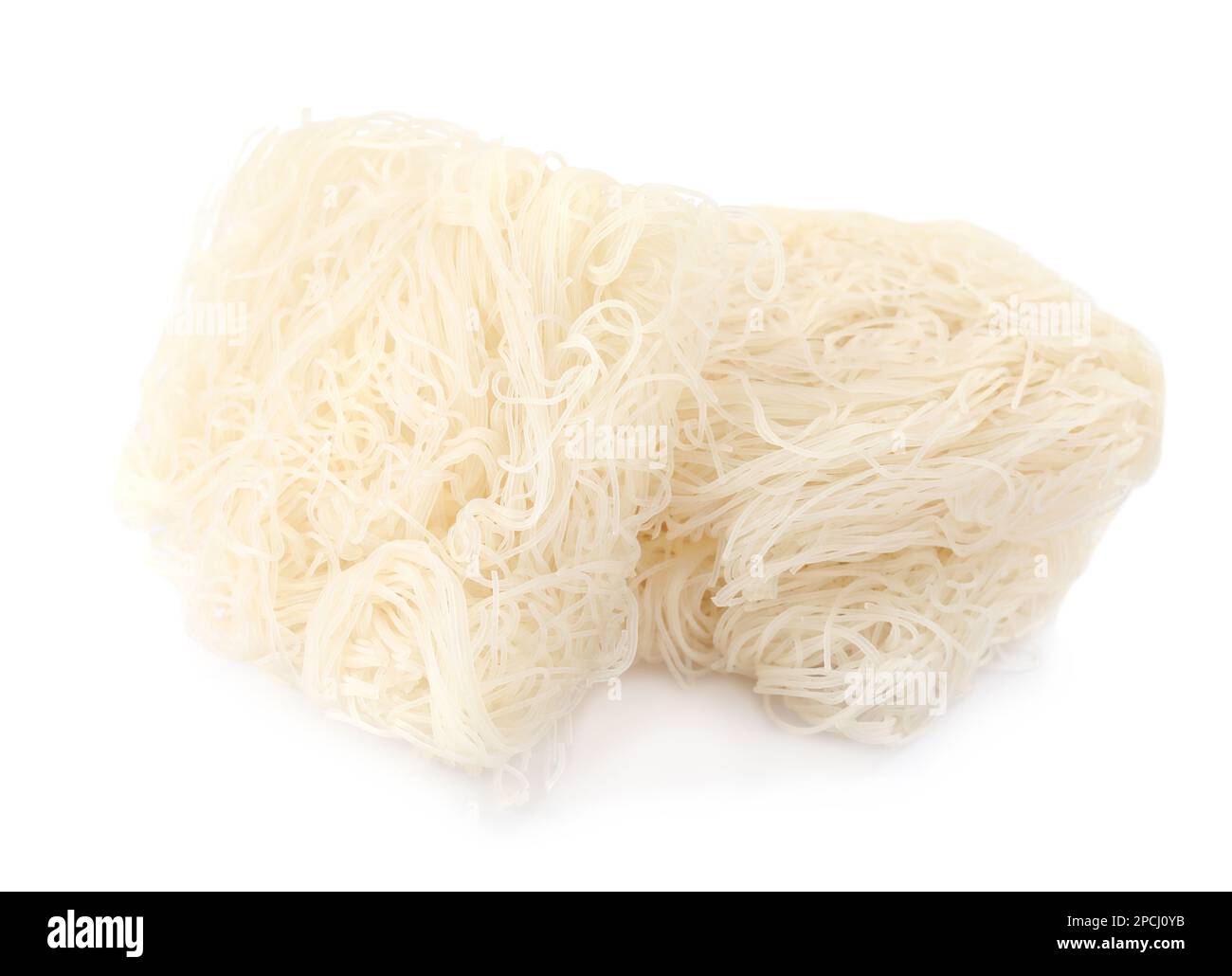 Bricks of dried rice noodles isolated on white. East Asian cuisine ...