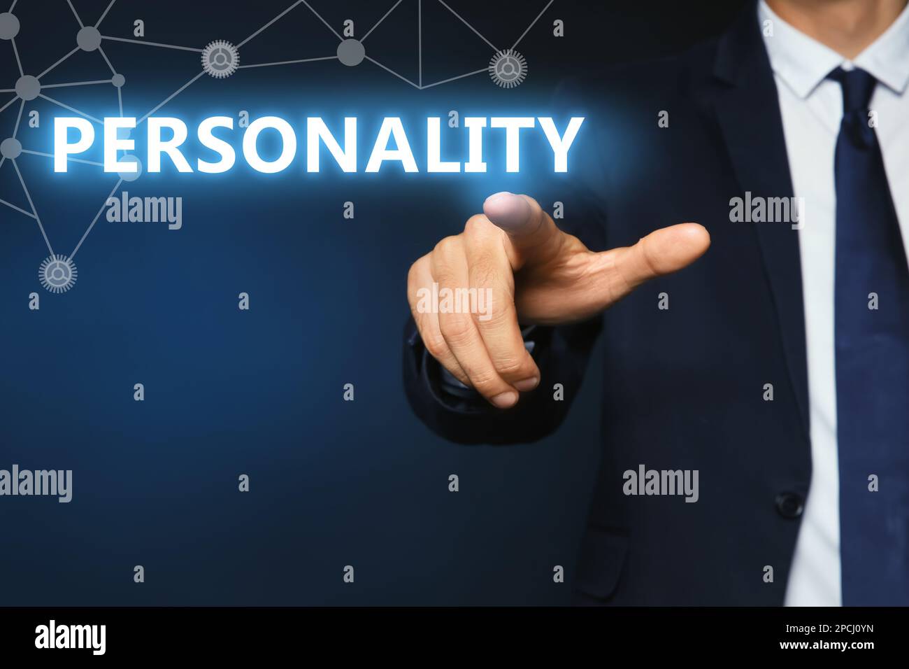 Man pointing at word PERSONALITY on virtual screen against dark blue ...