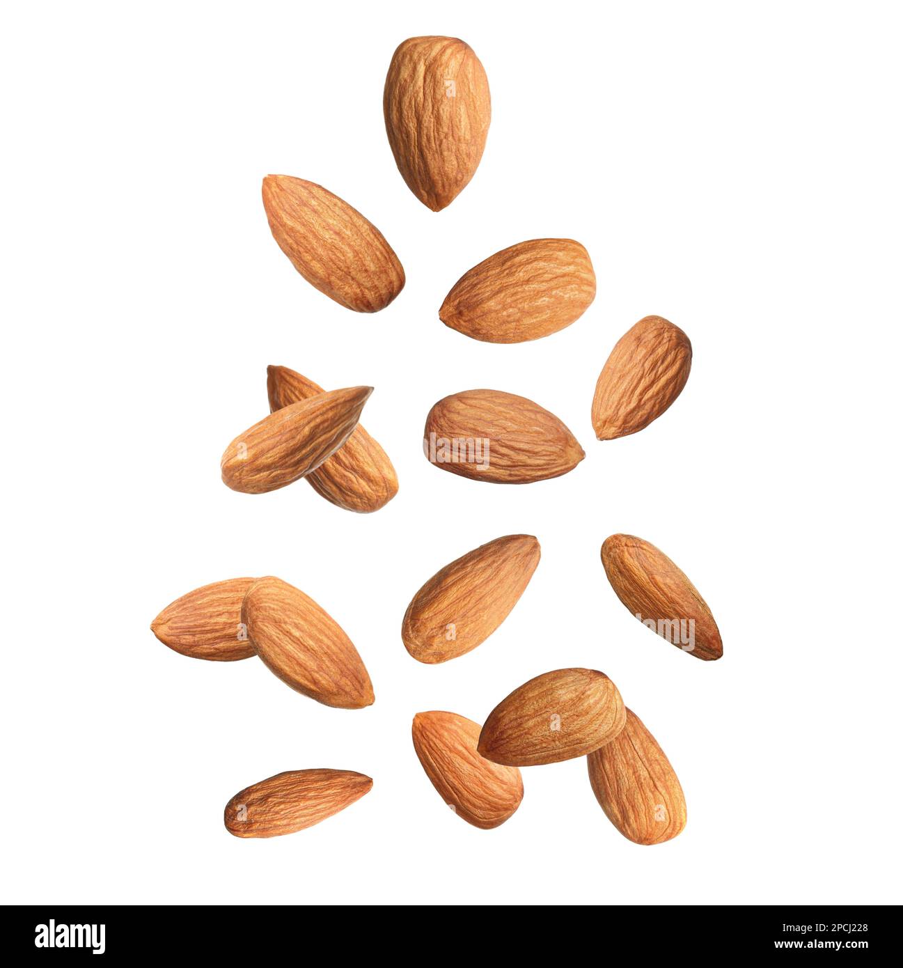 Many tasty almonds falling on white background Stock Photo - Alamy