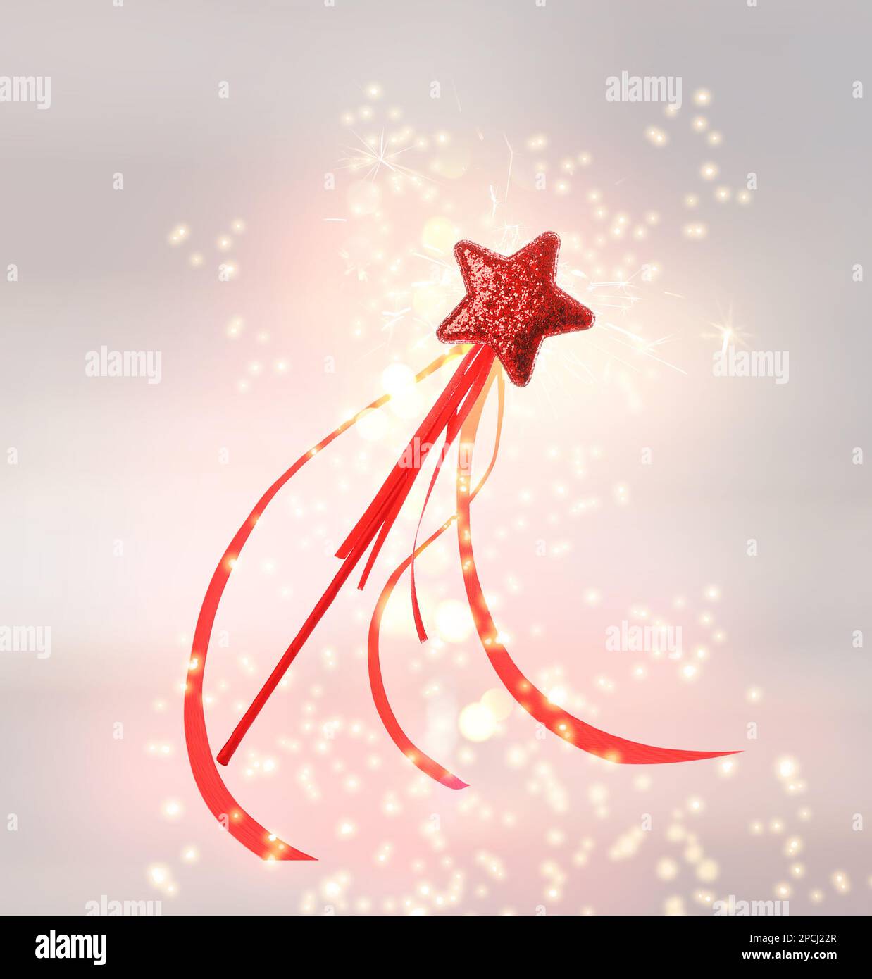 Beautiful red wand and shiny magical dust on light background Stock ...