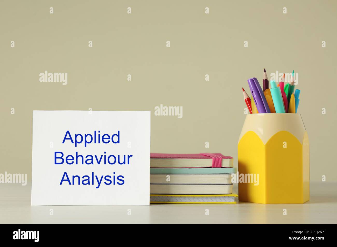 Set of stationery and card with text Applied Behavior Analysis on ...