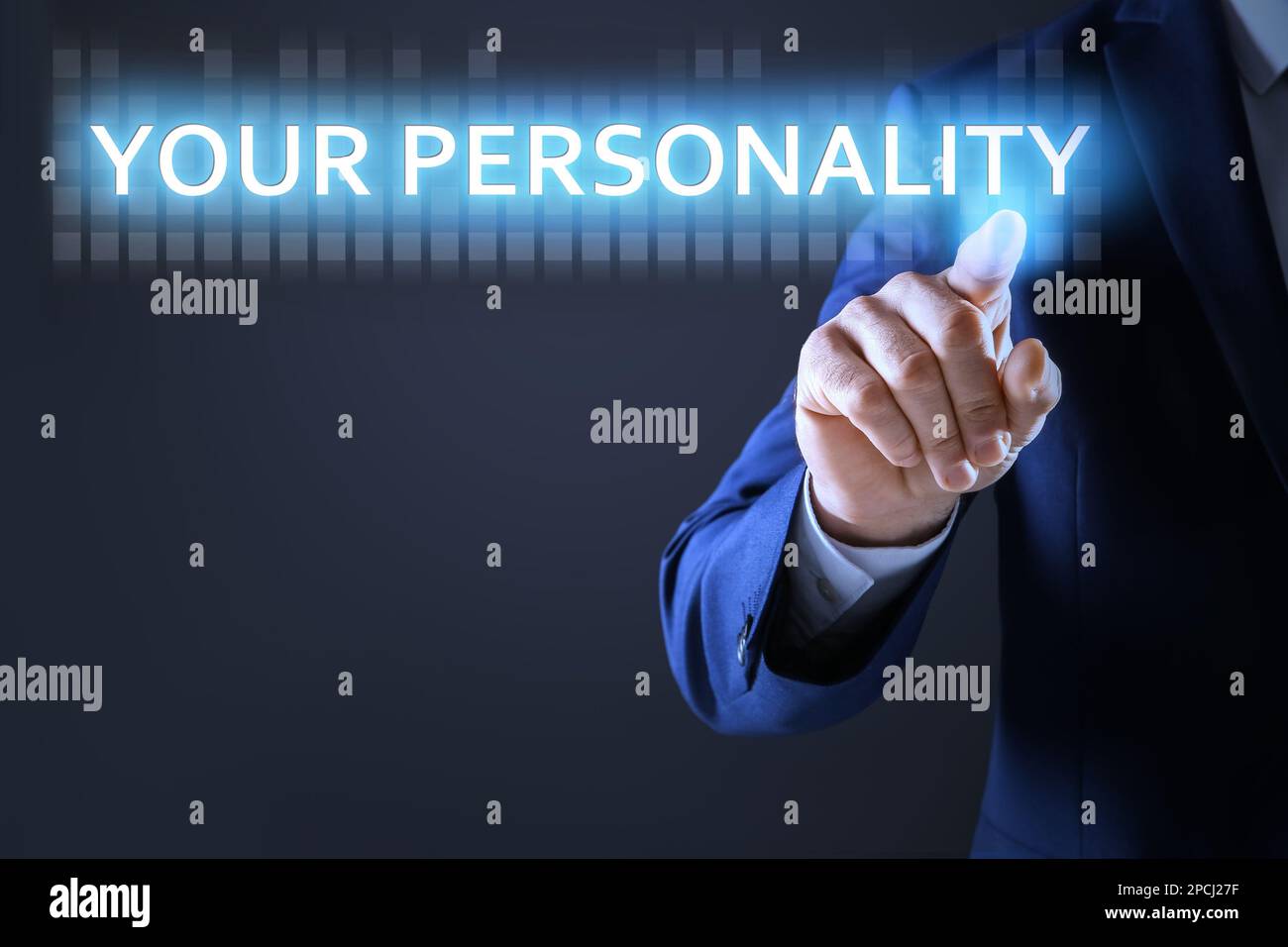 Man pointing at phrase YOUR PERSONALITY on virtual screen against dark ...